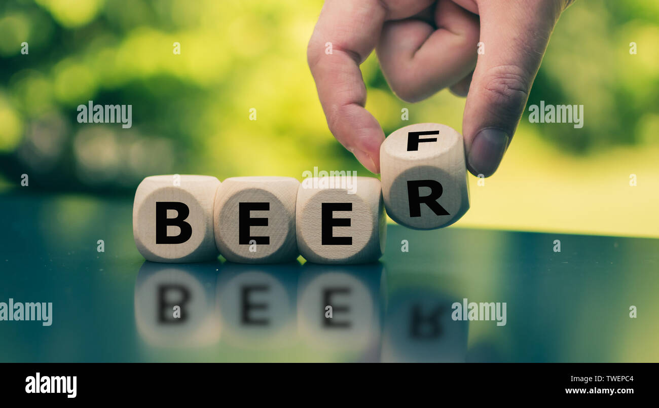 Beer and Beef. Hand turns a cube and changes the word "BEER" to "BEEF ...