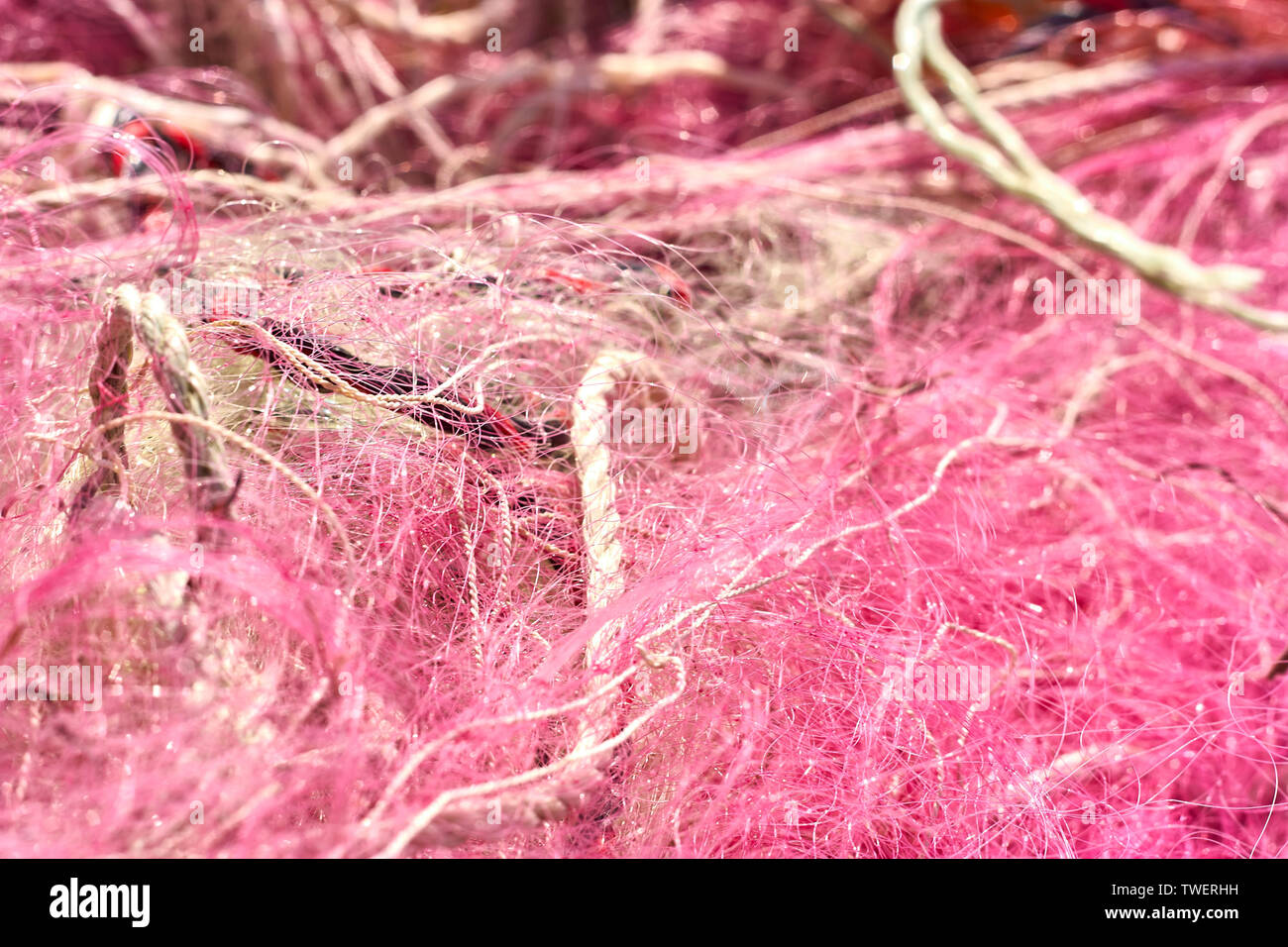 A tangled mess of fishing nets plastic rope and other debris washed up ...