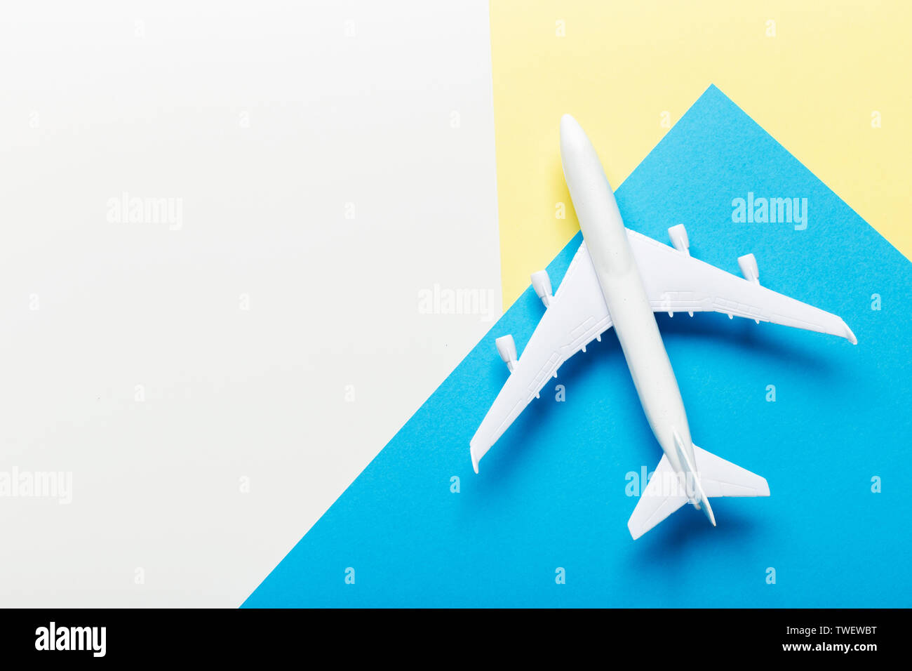 Miniature airplane travel theme Stock Photo - Alamy