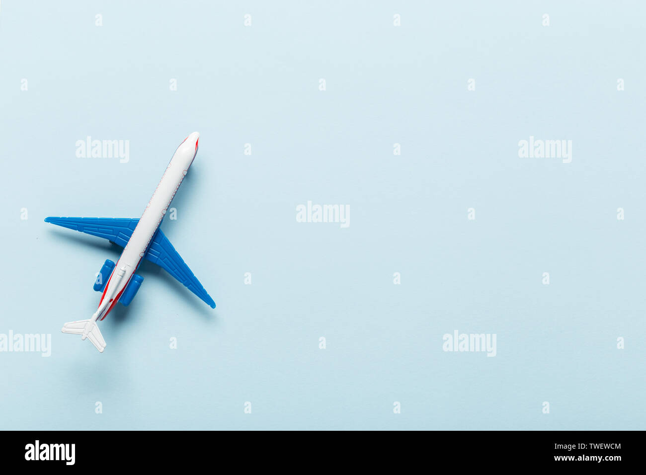 Miniature airplane travel theme Stock Photo - Alamy