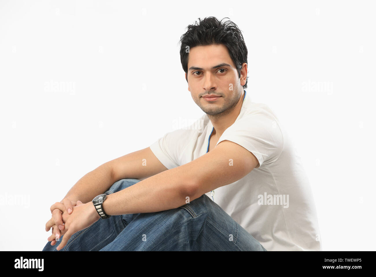 Portrait of a man sitting Stock Photo - Alamy