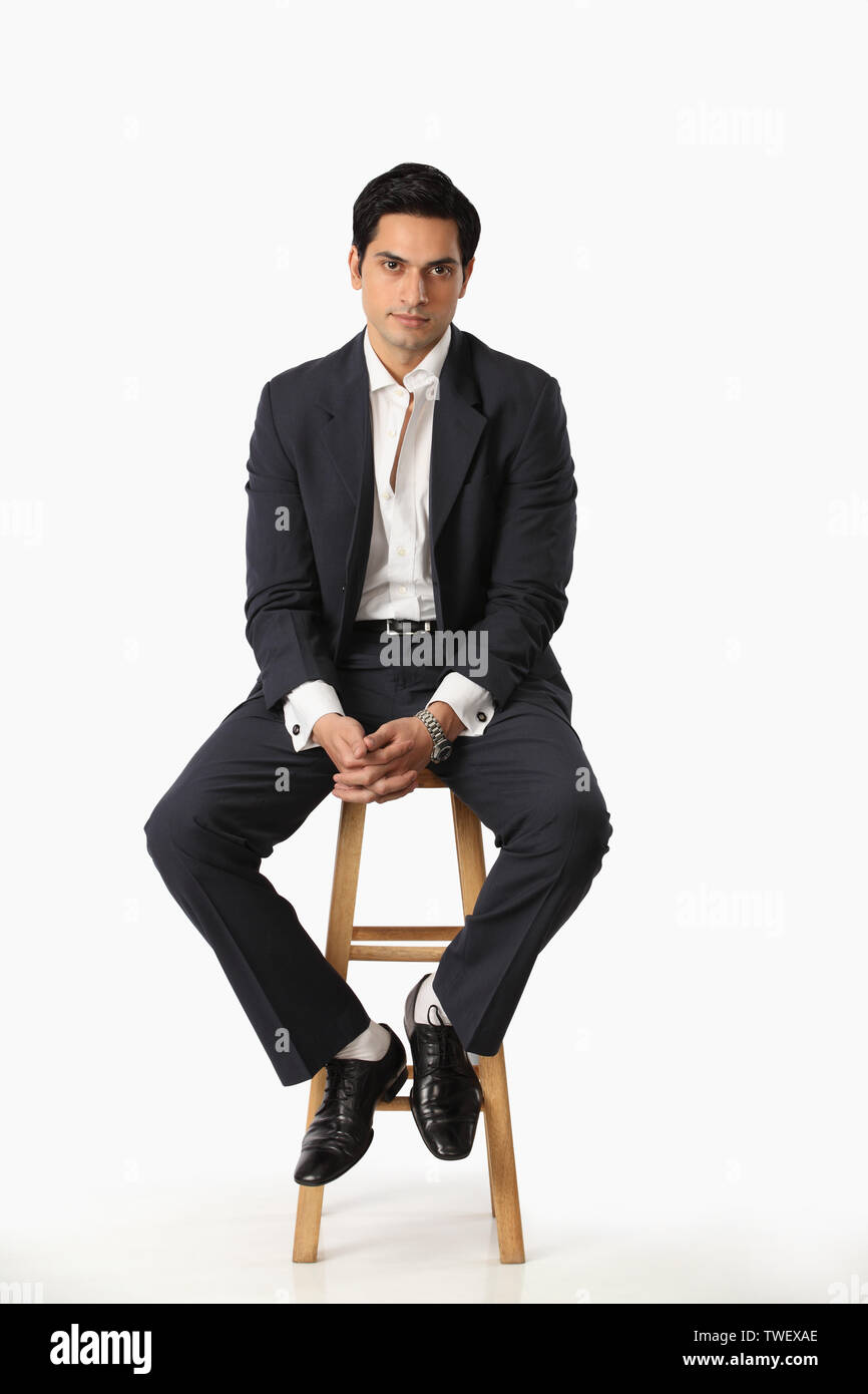 Hands holding stool hi-res stock photography and images - Alamy