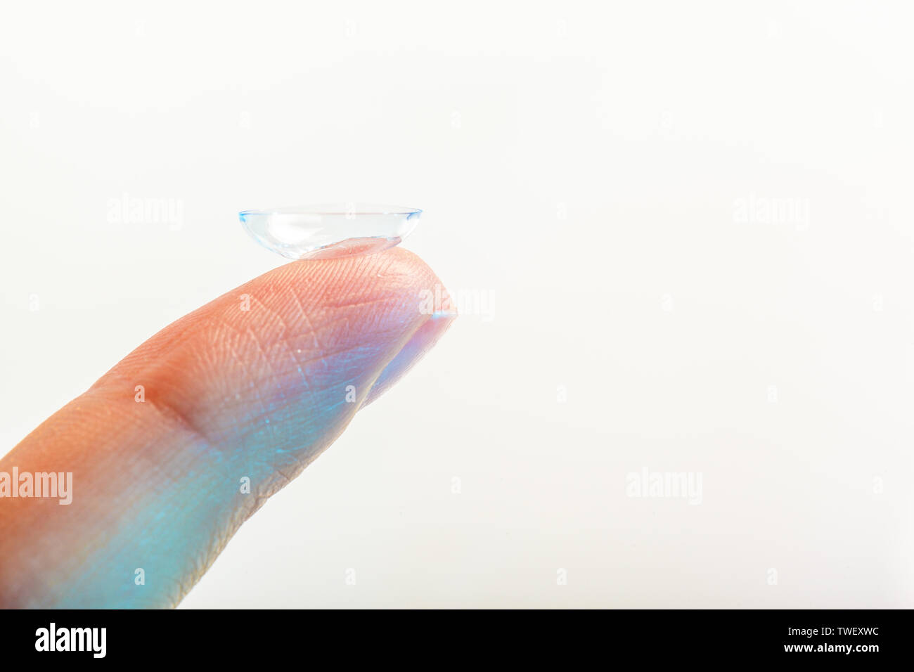 contact lens on finger Stock Photo - Alamy