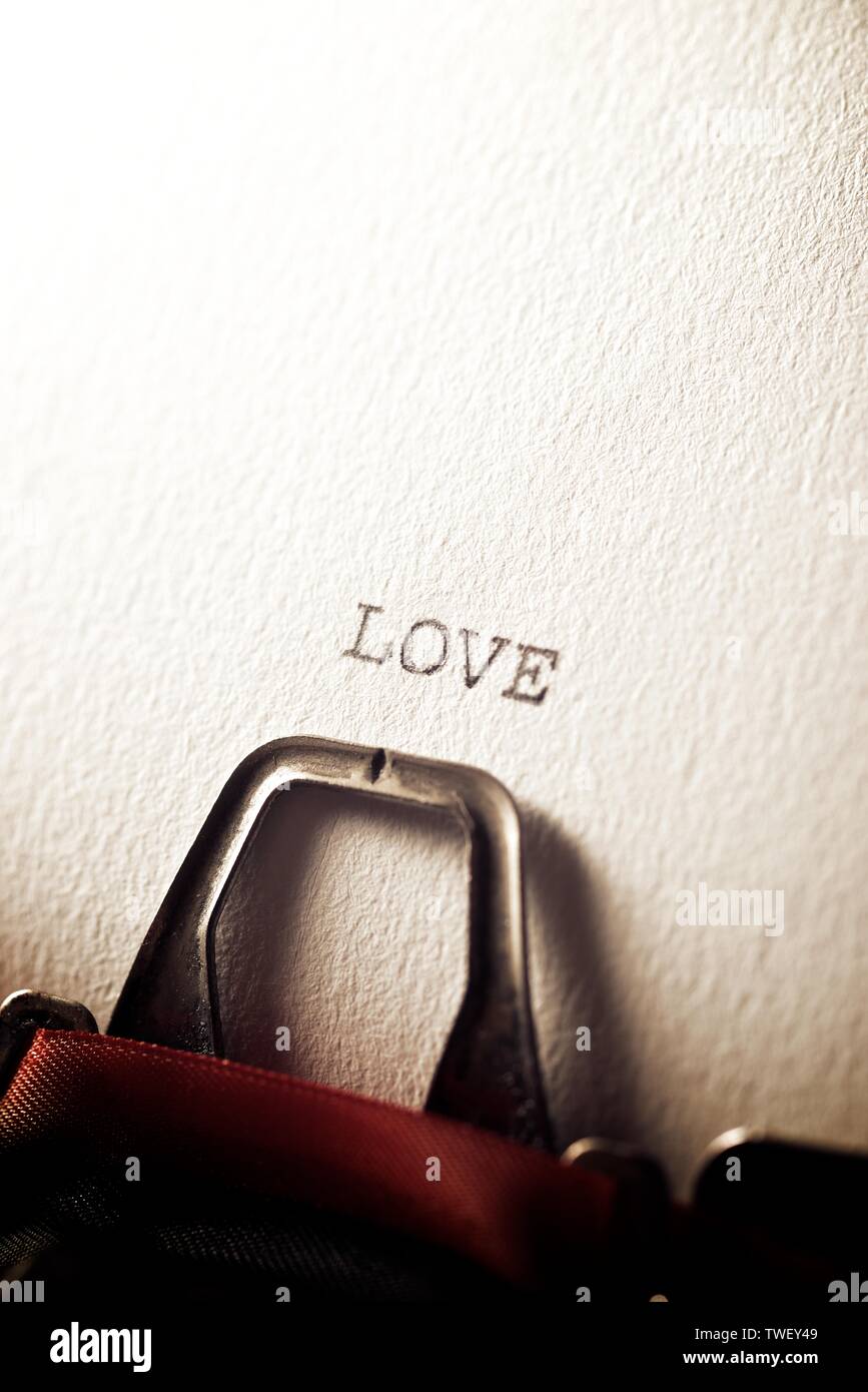The word, Love, written with a typewriter Stock Photo - Alamy