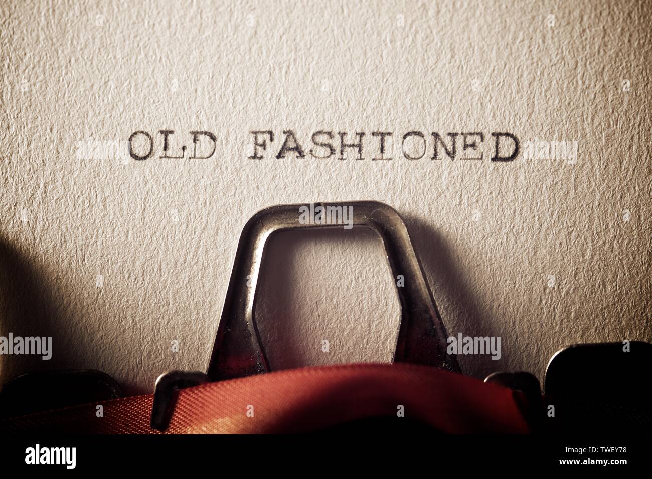 The words, old fashioned, written with a typewriter Stock Photo - Alamy