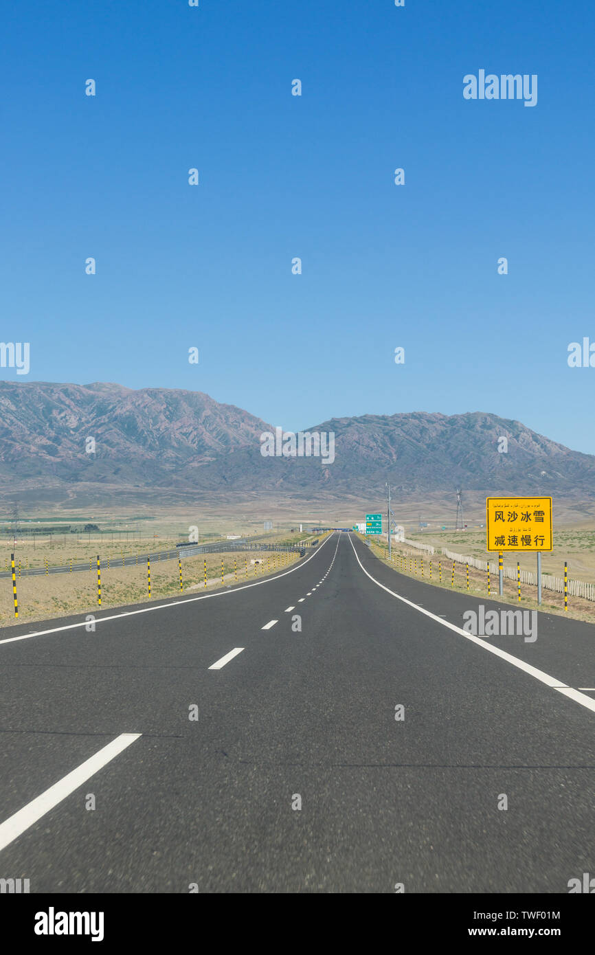 Gobi Beach Expressway car background - warning sign Stock Photo - Alamy