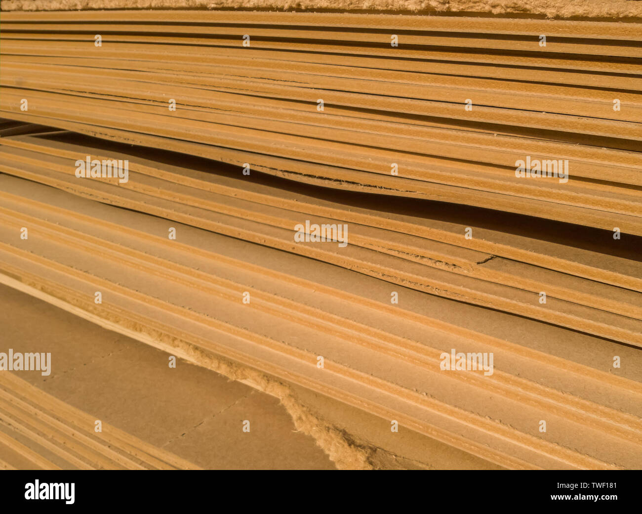 A bunch of old MDF of poor quality. Selective focus Stock Photo - Alamy