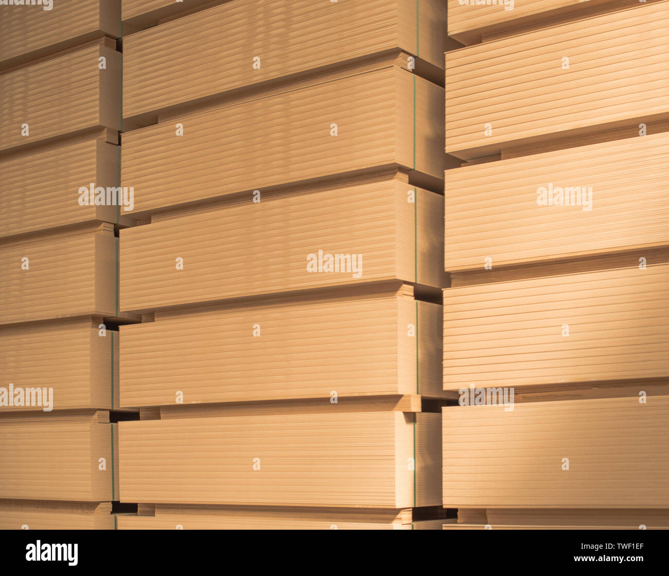 Pack of MDF laid in rows on the warehouse Stock Photo - Alamy