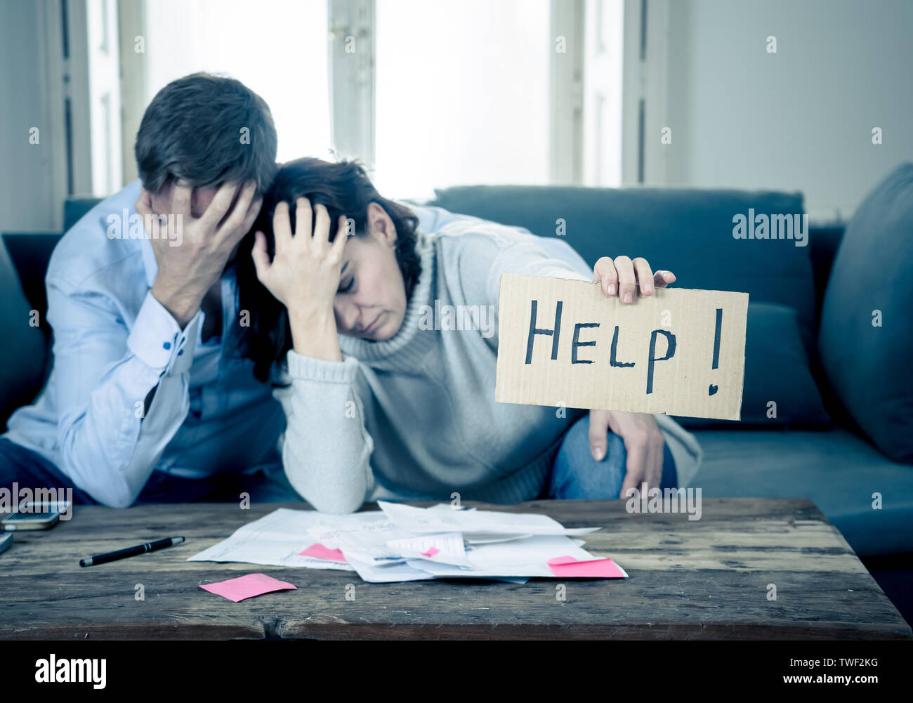 Young couple bills calculator hi-res stock photography and images - Alamy