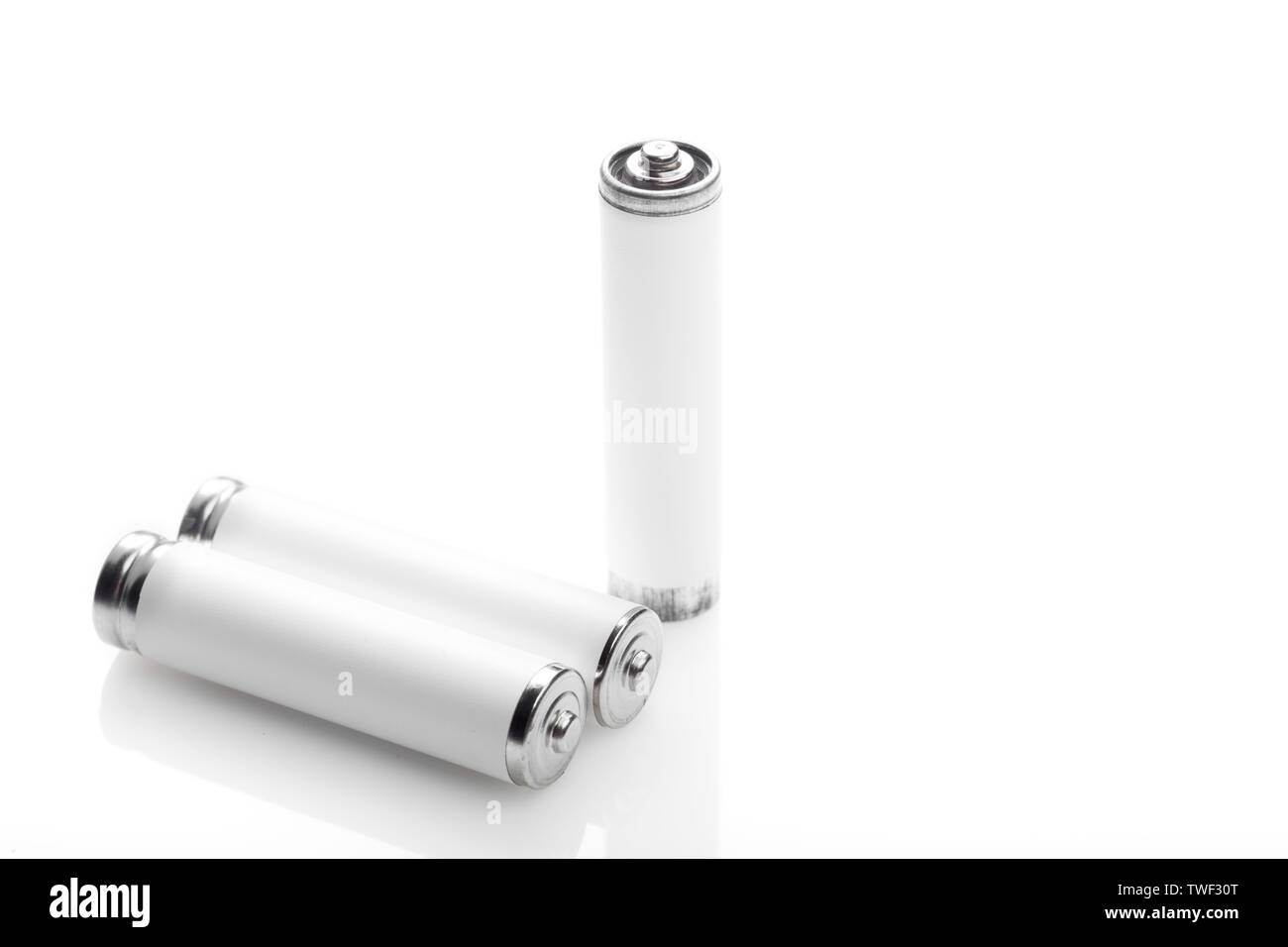 Battery on a white background Stock Photo - Alamy