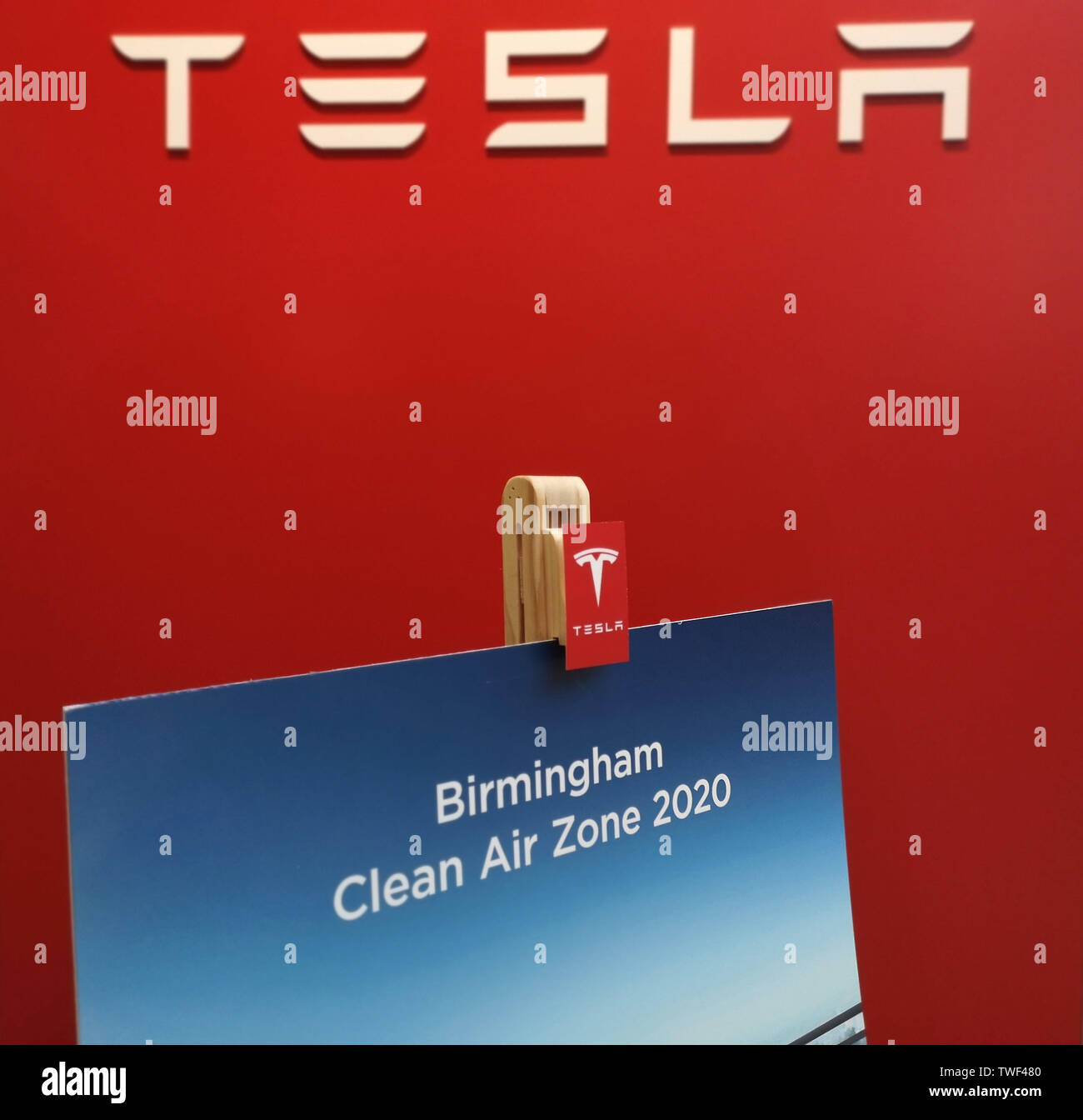 Tesla sales branch in Touchwood Solihull, UK, shows a sign for ...