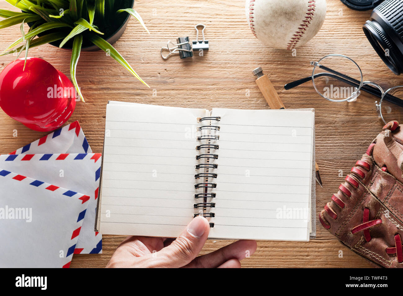 wooden desktop with blank notebook paper background Stock Photo - Alamy