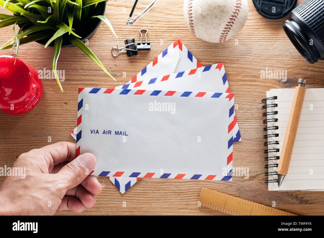 air mail envelope on the wood table Stock Photo - Alamy