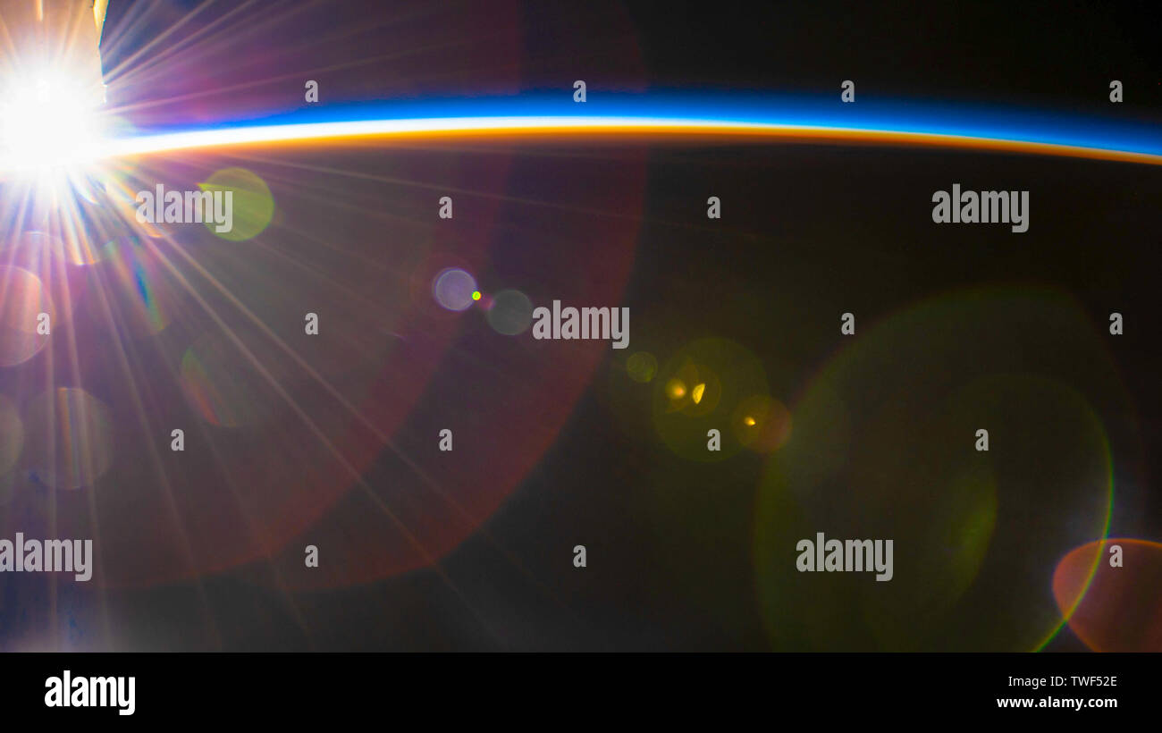 Sunset flares over the South Pacific. The beauty in nature of our ...