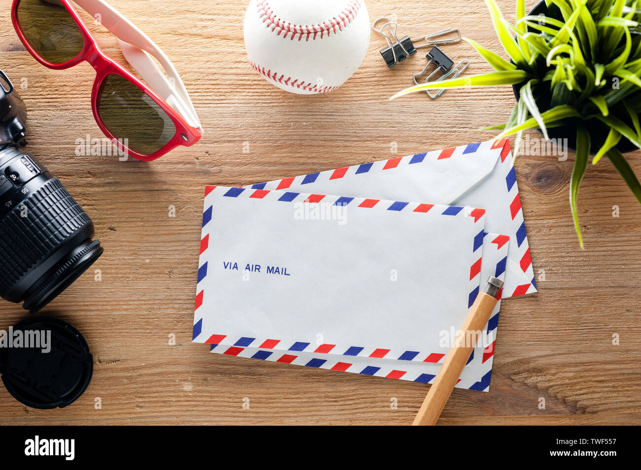 air mail envelope on the wood table Stock Photo - Alamy