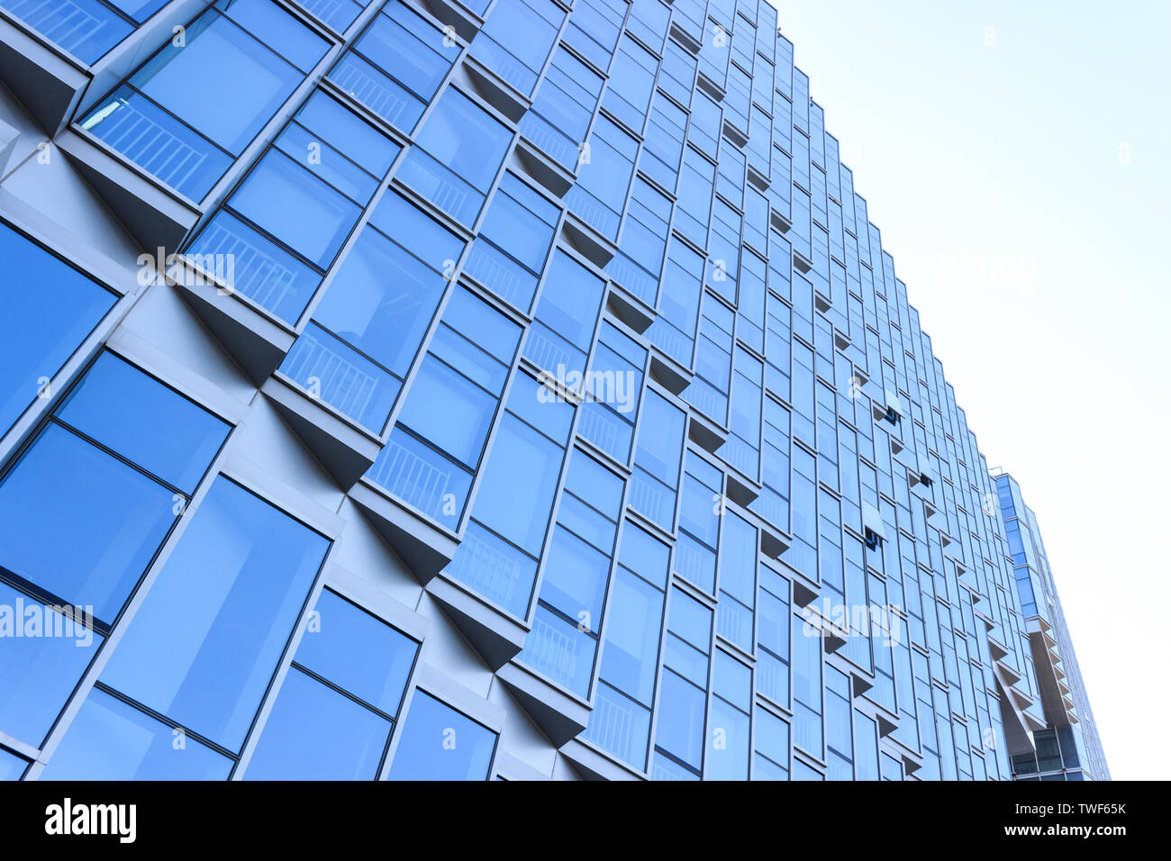 Modern architecture blue glass curtain wall Stock Photo - Alamy