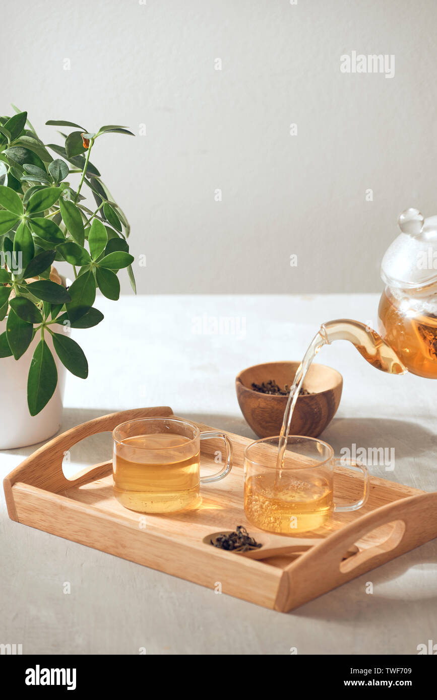 Pouring tea into glass hi-res stock photography and images - Alamy