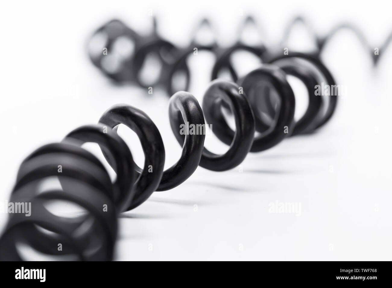 black wire isolated on a white background Stock Photo - Alamy