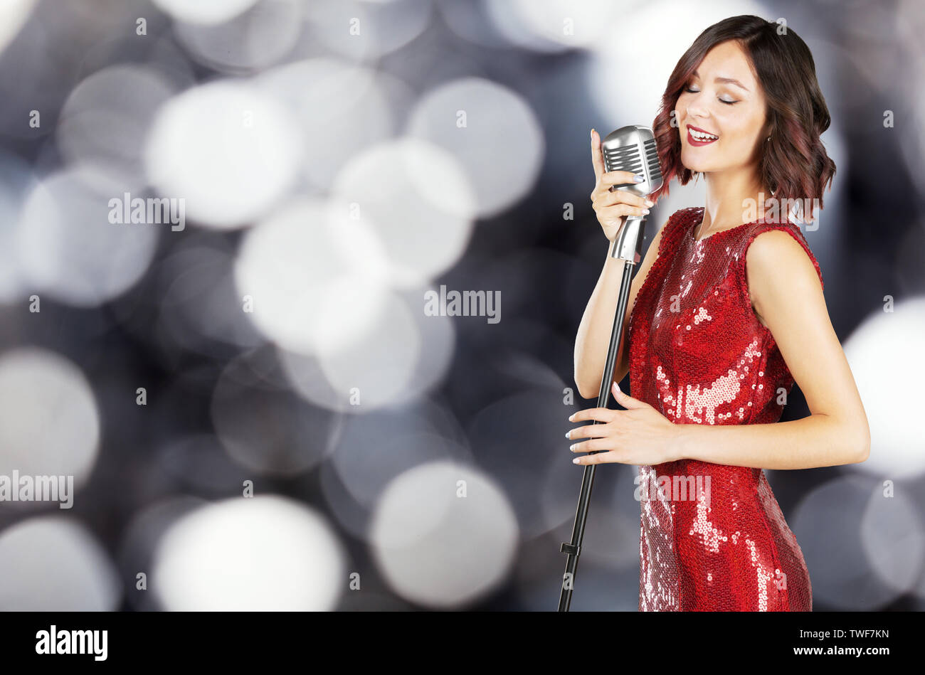 beautiful young singer Stock Photo - Alamy