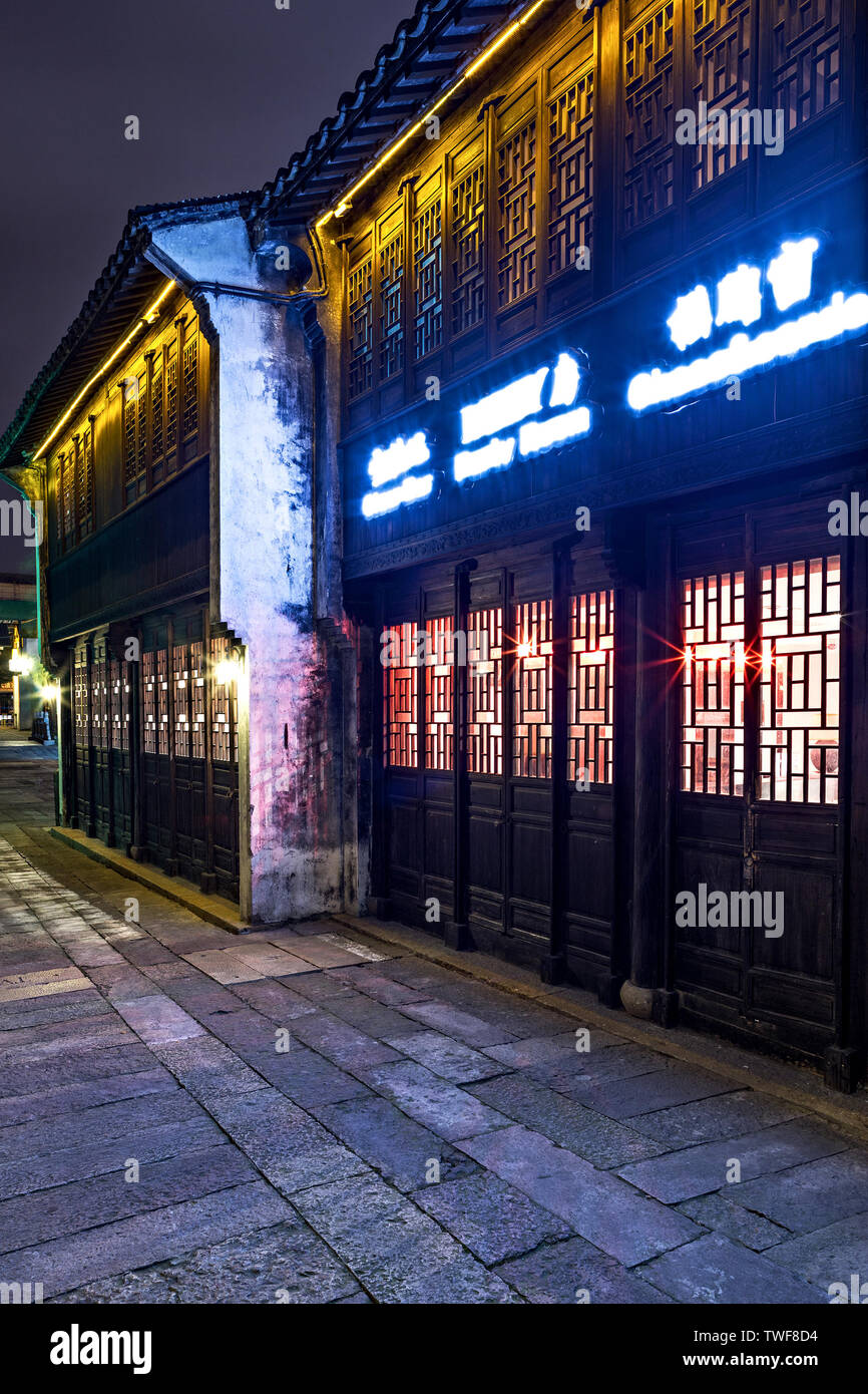 Night scene of traditional building near the river Stock Photo - Alamy