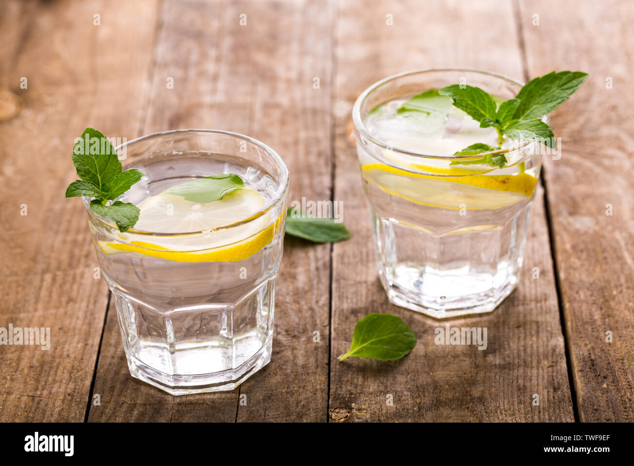 Lemonade, fresh lemonade and mint leaves, detox water Stock Photo - Alamy