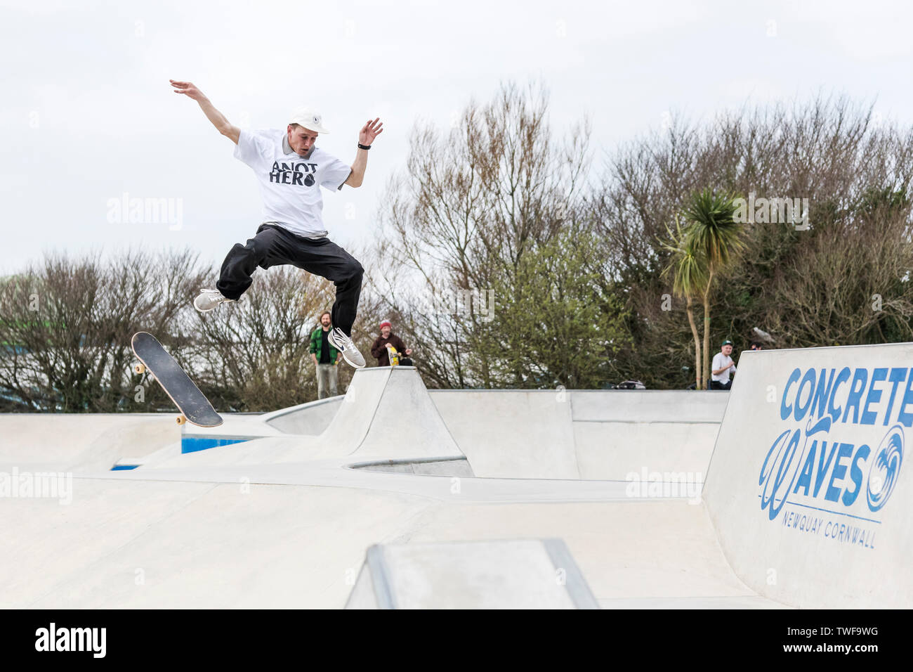 A skateboarder attempting an aerial trick at Concrete Waves Skateboard ...