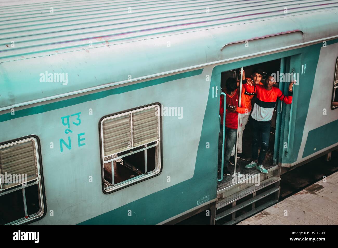 AGRA, INDIA - May 08, 2018: Young guys on a train in India Stock Photo ...
