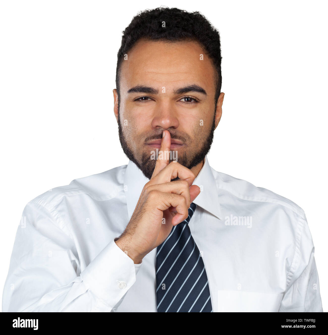 Guy with finger on lips over white background, over white background ...