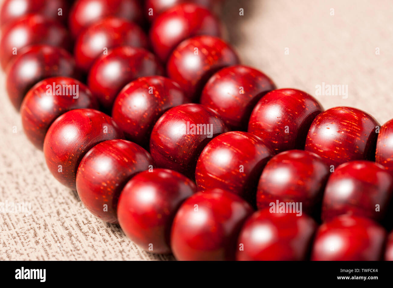 Chicken blood rosewood handstring Stock Photo - Alamy