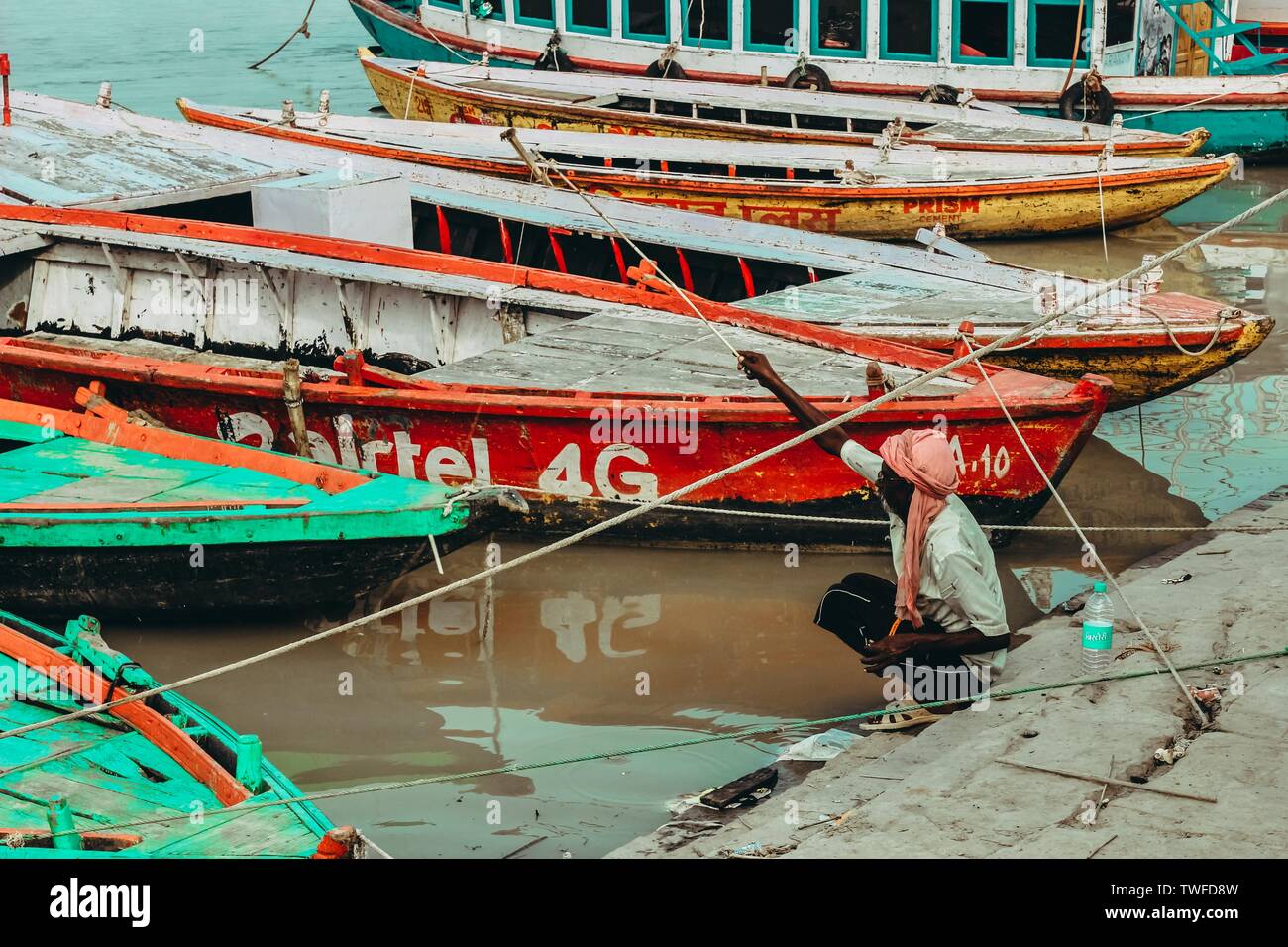 VARANASI, INDIA - Aug 11, 2018: Fisherman, fishing whit handmade tool ...