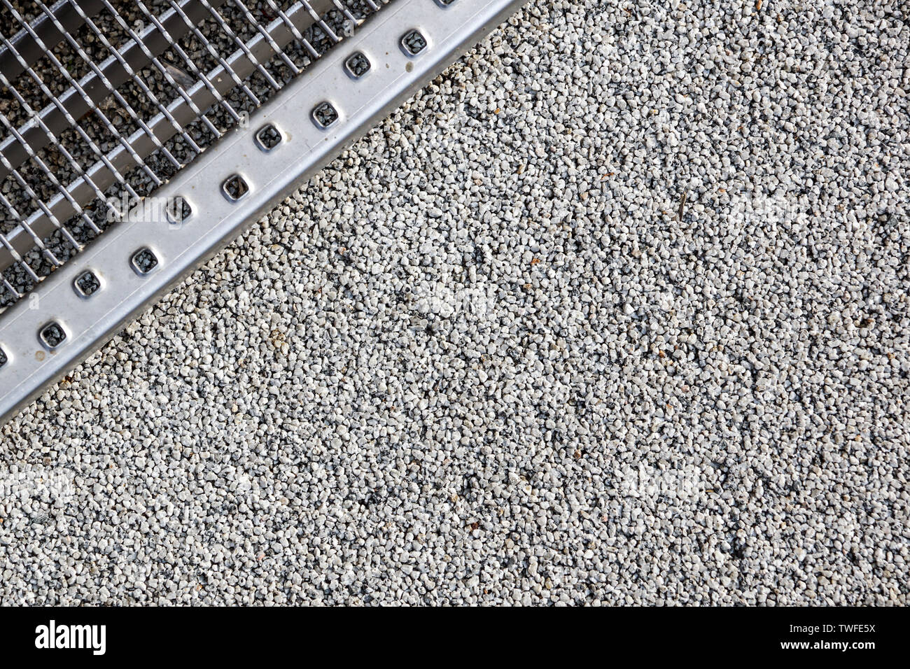 metal grid background on pavement on the street Stock Photo - Alamy