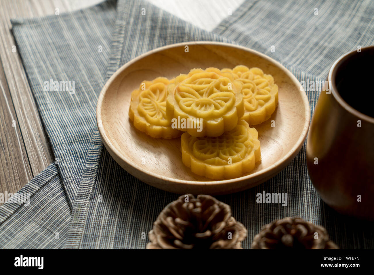 Moon cake with wood pattern background Stock Photo - Alamy