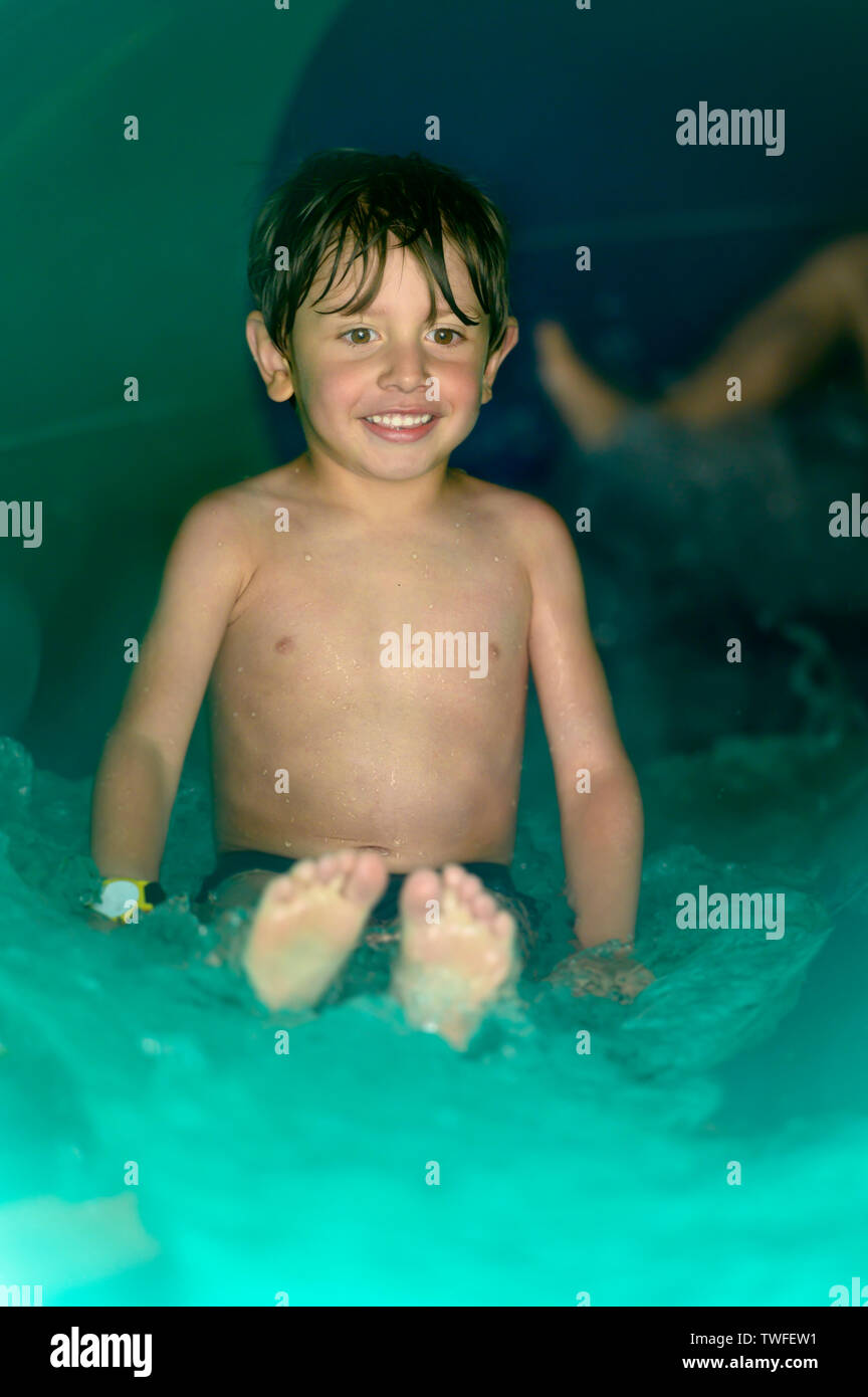 Boy water slide hi-res stock photography and images - Alamy