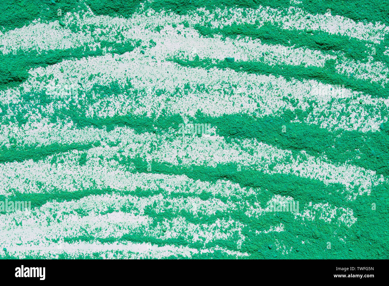 green powder pigment pattern background macro Stock Photo - Alamy