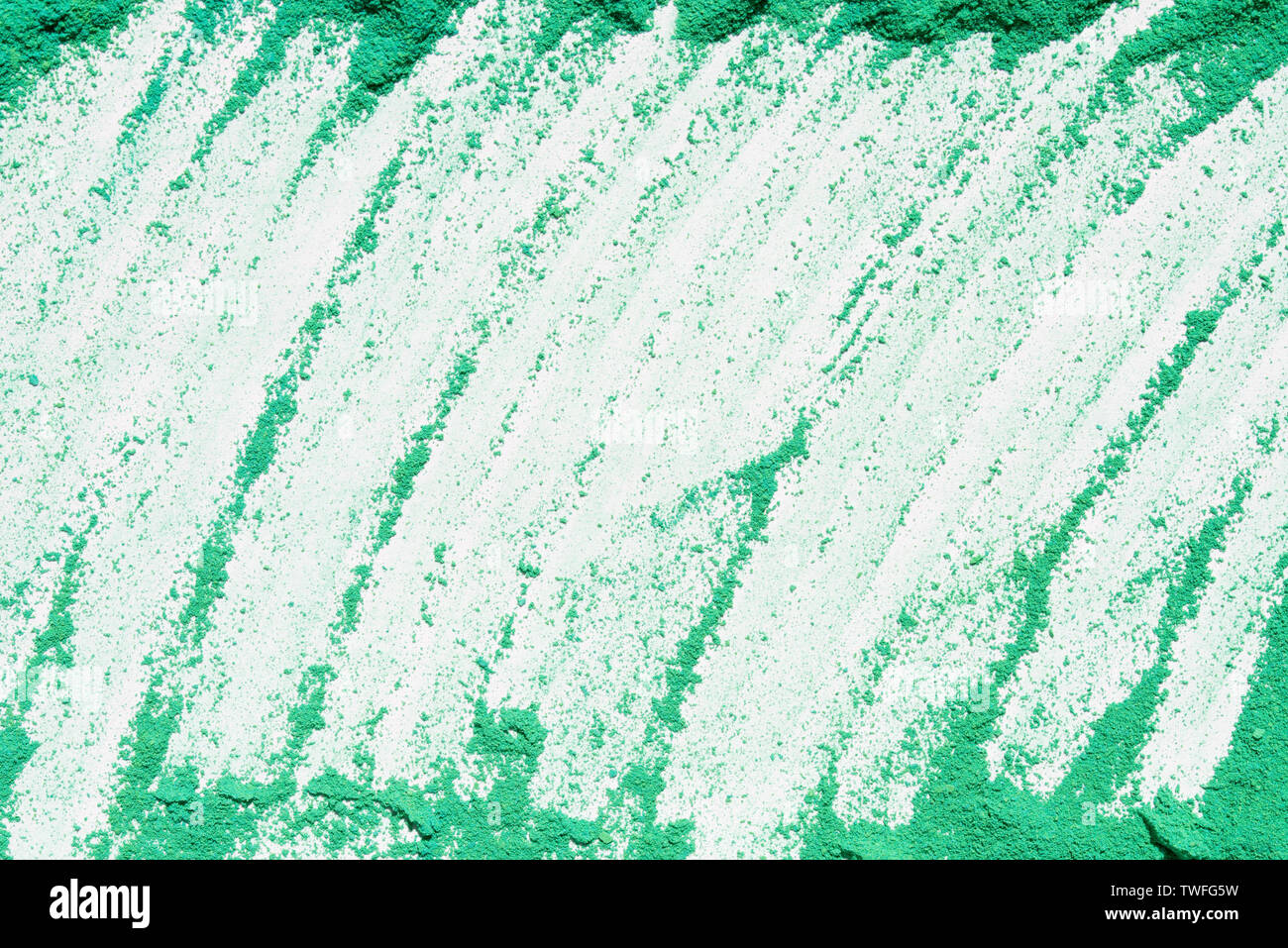 green powder pigment pattern background macro Stock Photo - Alamy