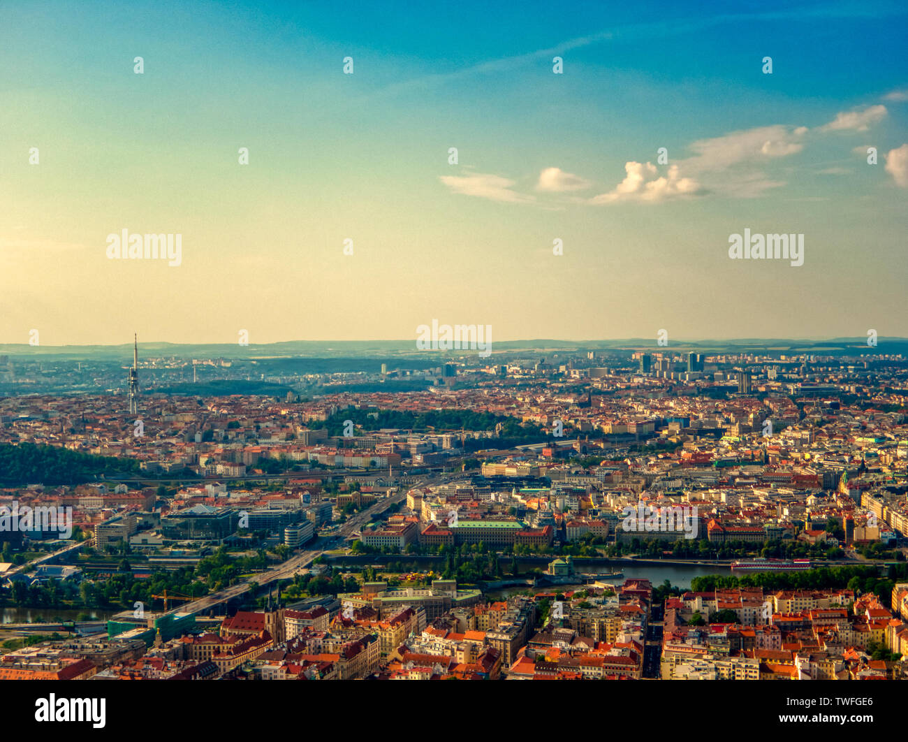 aerial view of Prague with tv tower in the far back and Vltava River ...