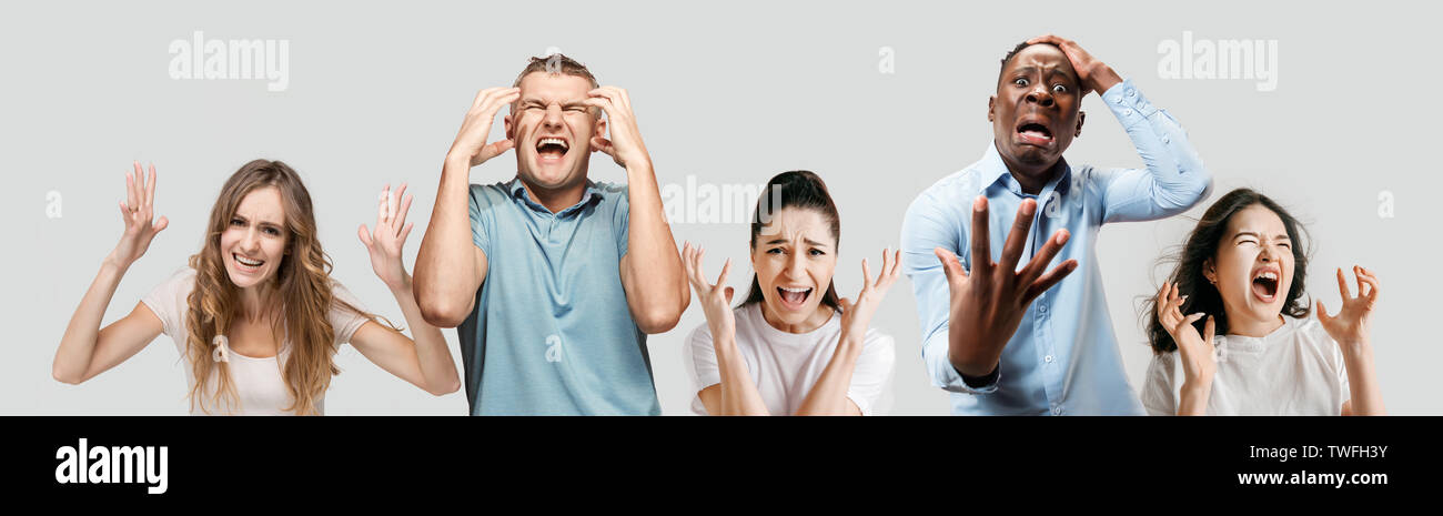 Horrible, stress, shock. Half-length portrait isolated at white studio ...