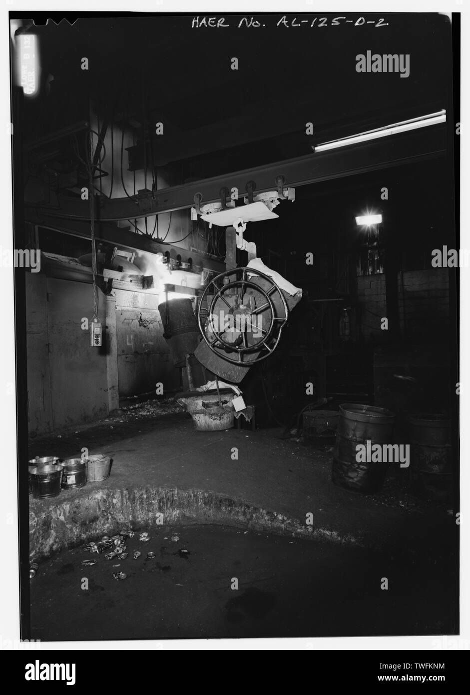 POURING IRON FROM ELECTRIC FURNACE INTO BULL LADLE. - Southern Ductile ...