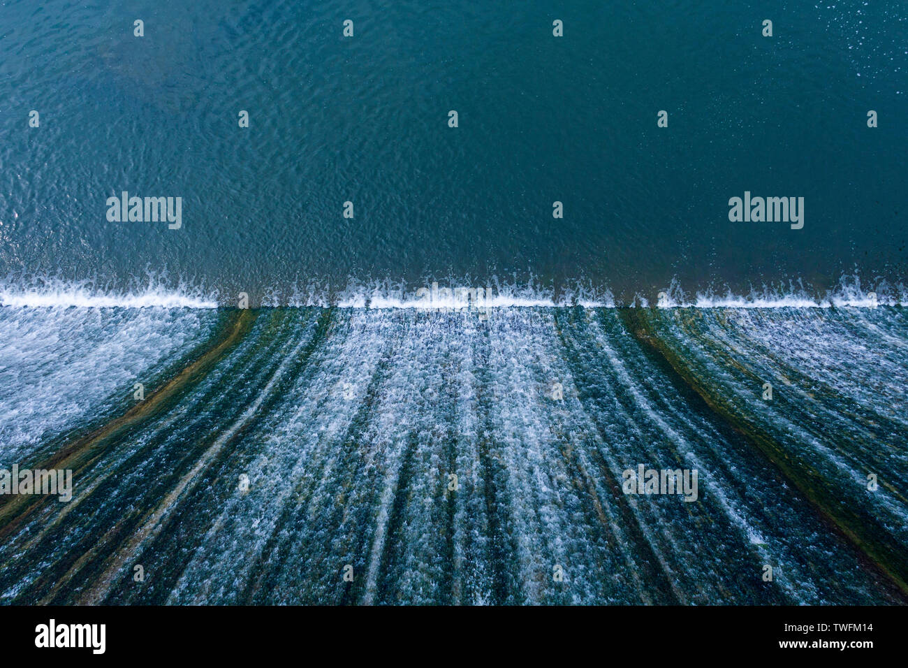 The water curtain where the dam falls Stock Photo - Alamy