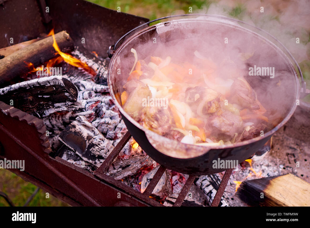 Cooking pilaf on the campfire hi-res stock photography and images - Alamy