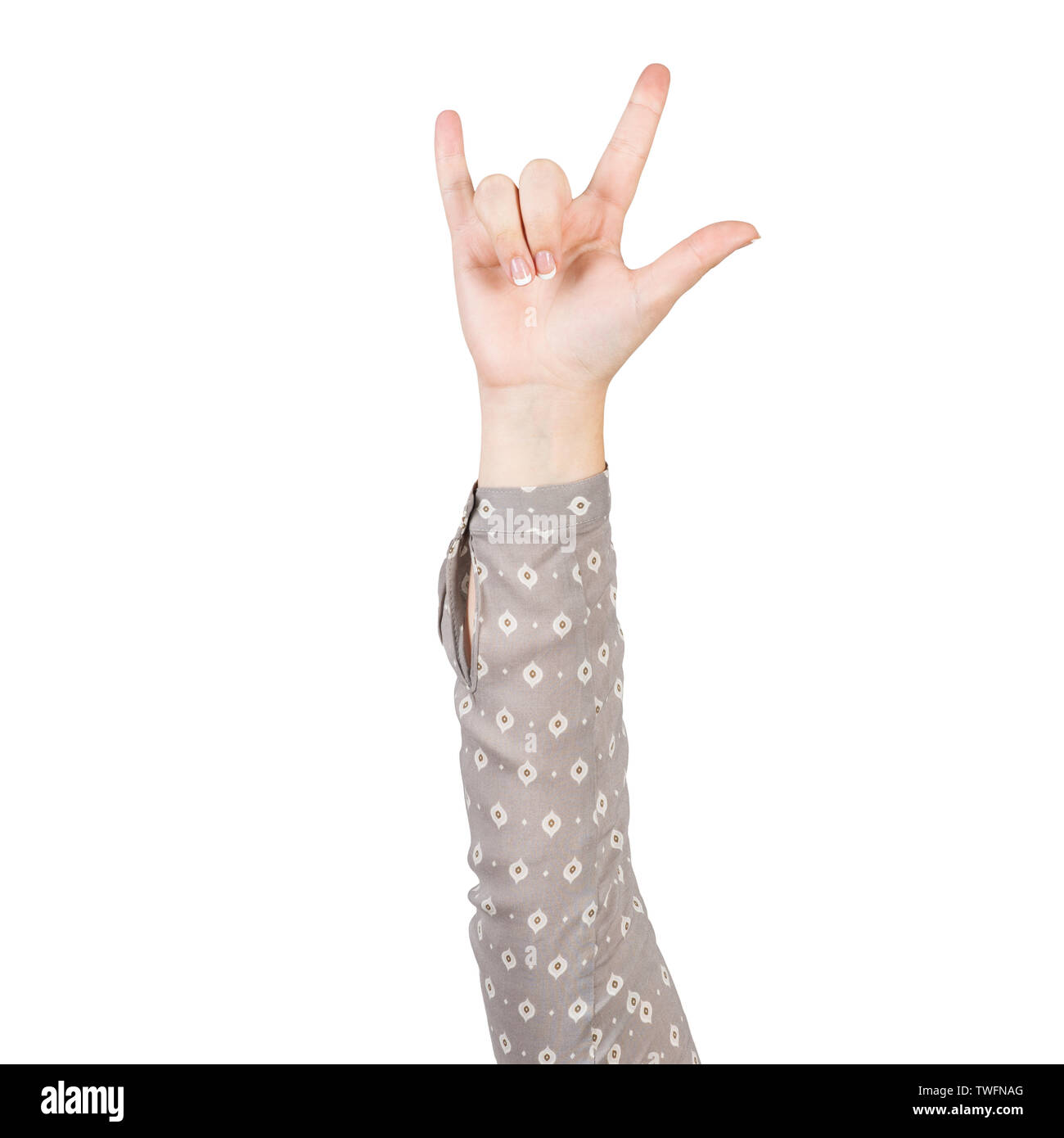 Woman hand in grey blouse showing devil horns gesture. Winning and ...