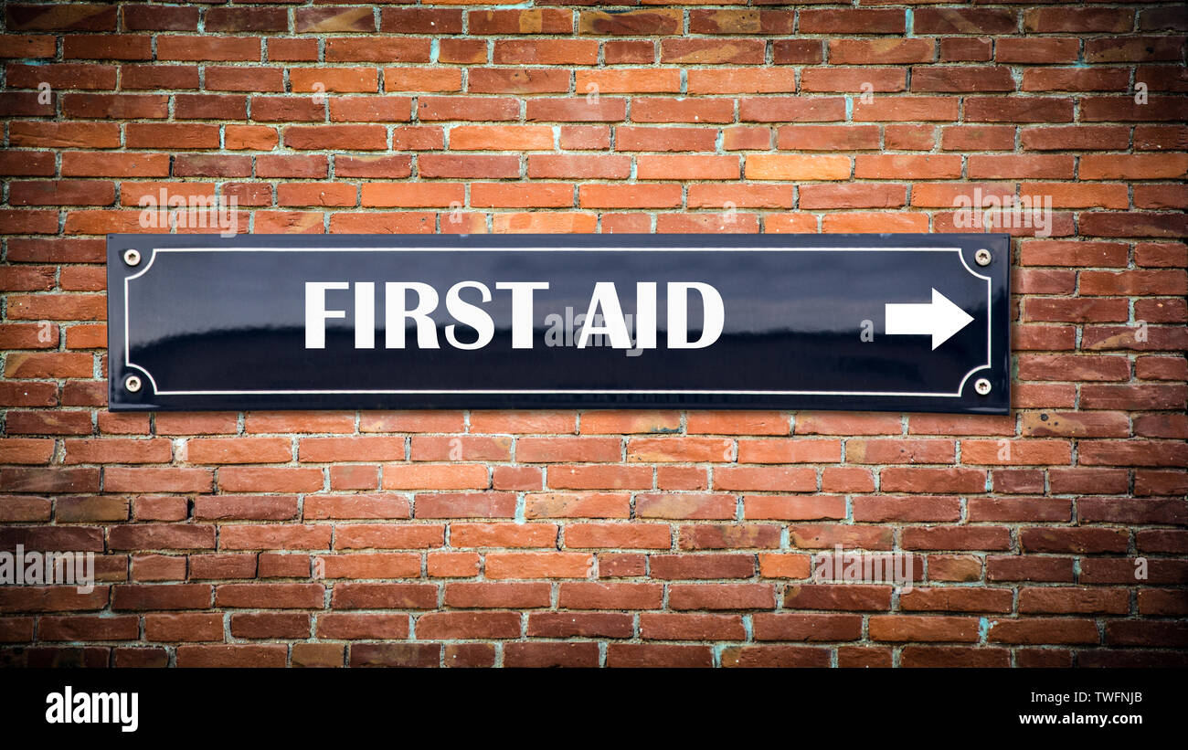 Street Sign the Direction Way to First Aid Stock Photo - Alamy