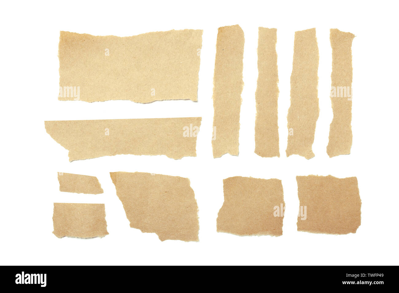brown ripped pieces of paper on white background Stock Photo - Alamy