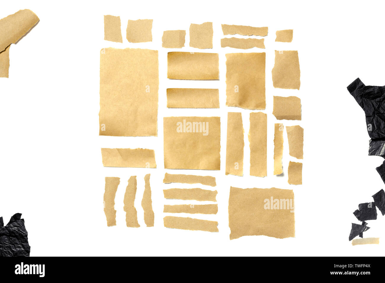 brown ripped pieces of paper on white background Stock Photo - Alamy