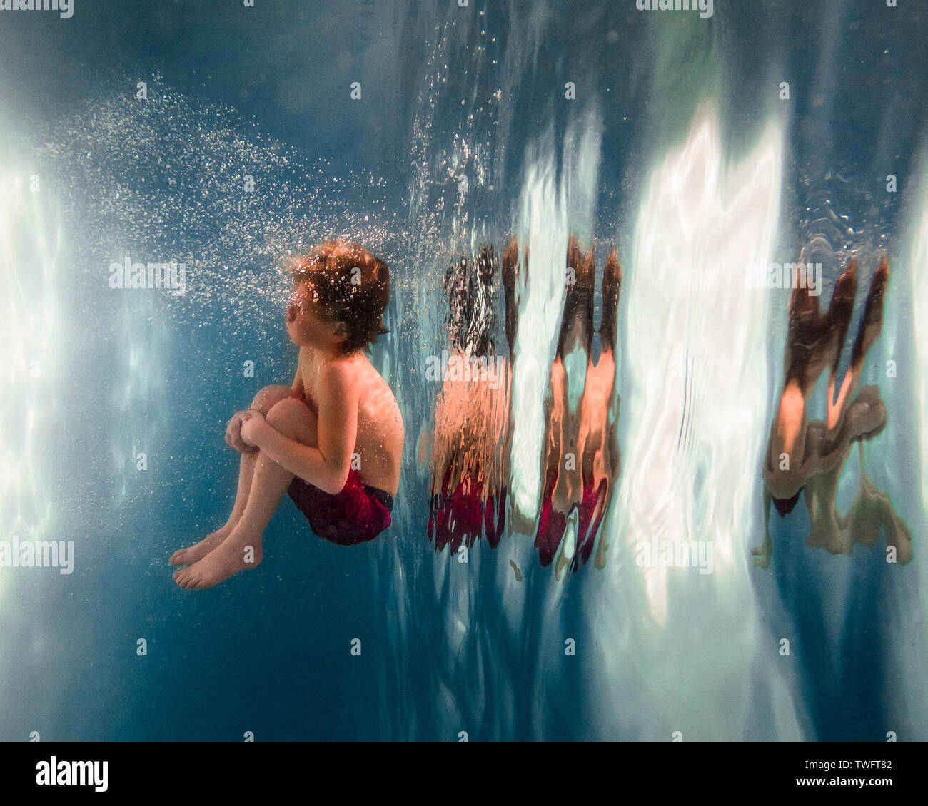 Underwater Pool Hugging High Resolution Stock Photography and Images ...