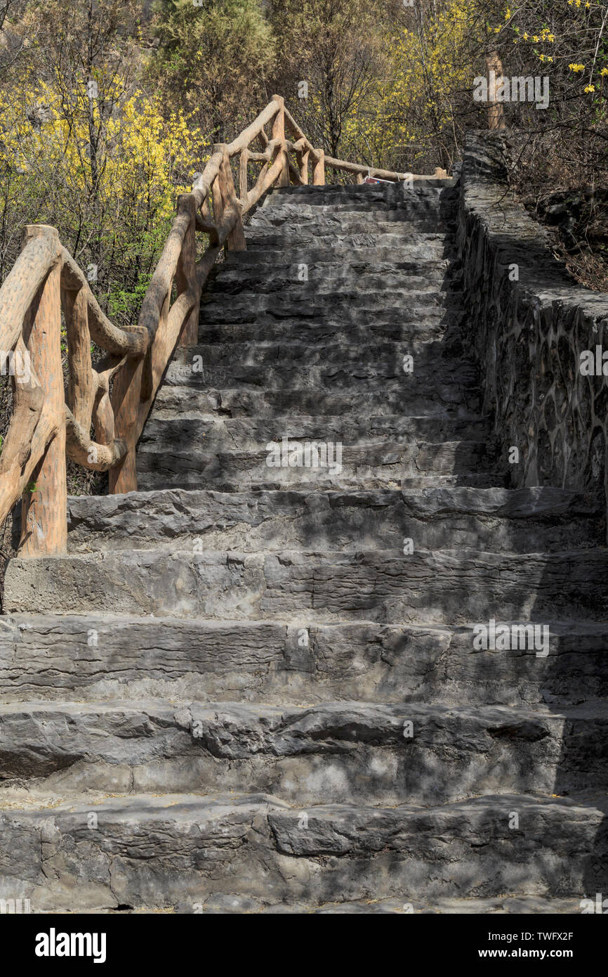 The steep stone ladder in the valley Stock Photo - Alamy