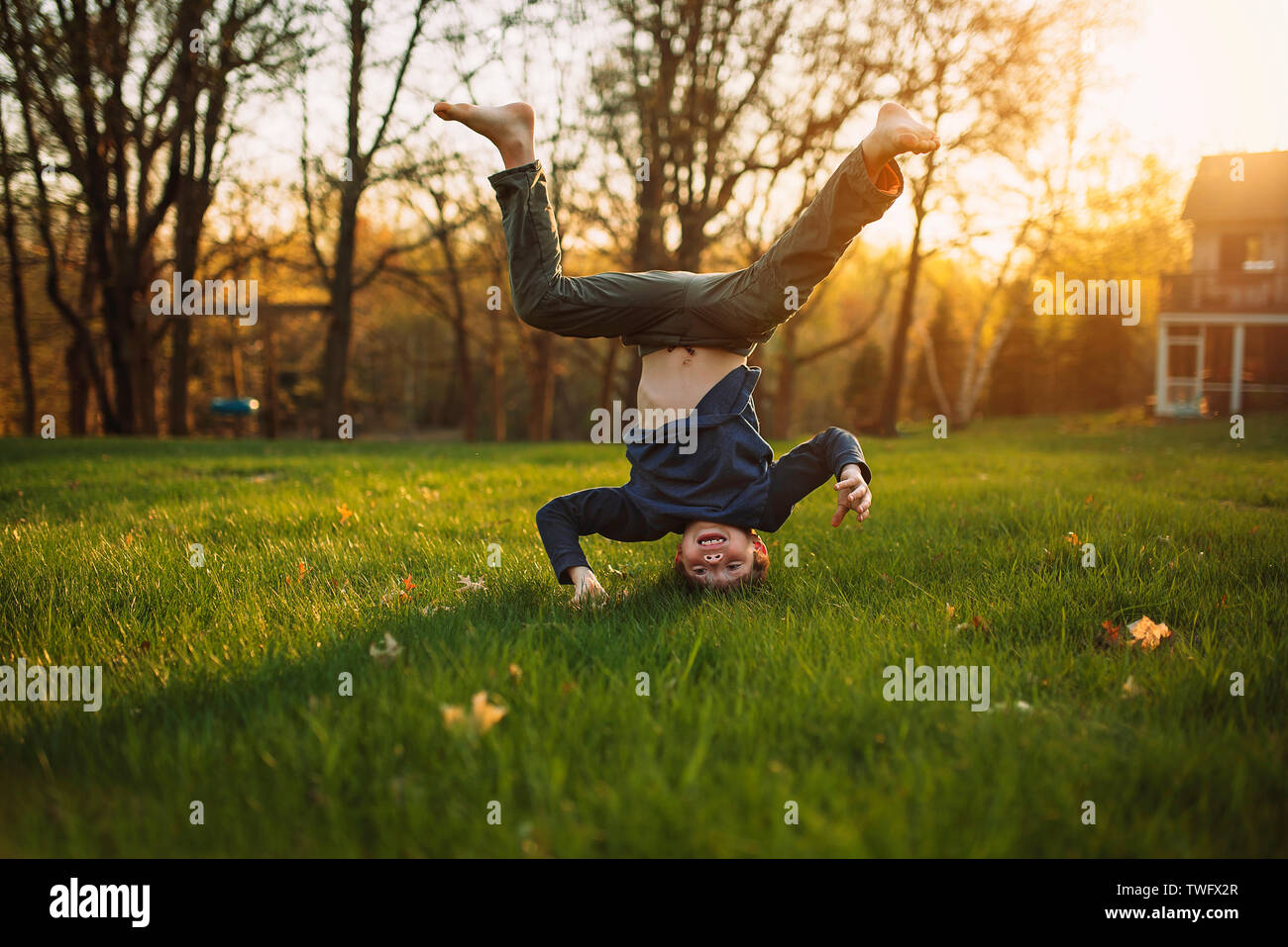Boy somersault hi-res stock photography and images - Alamy