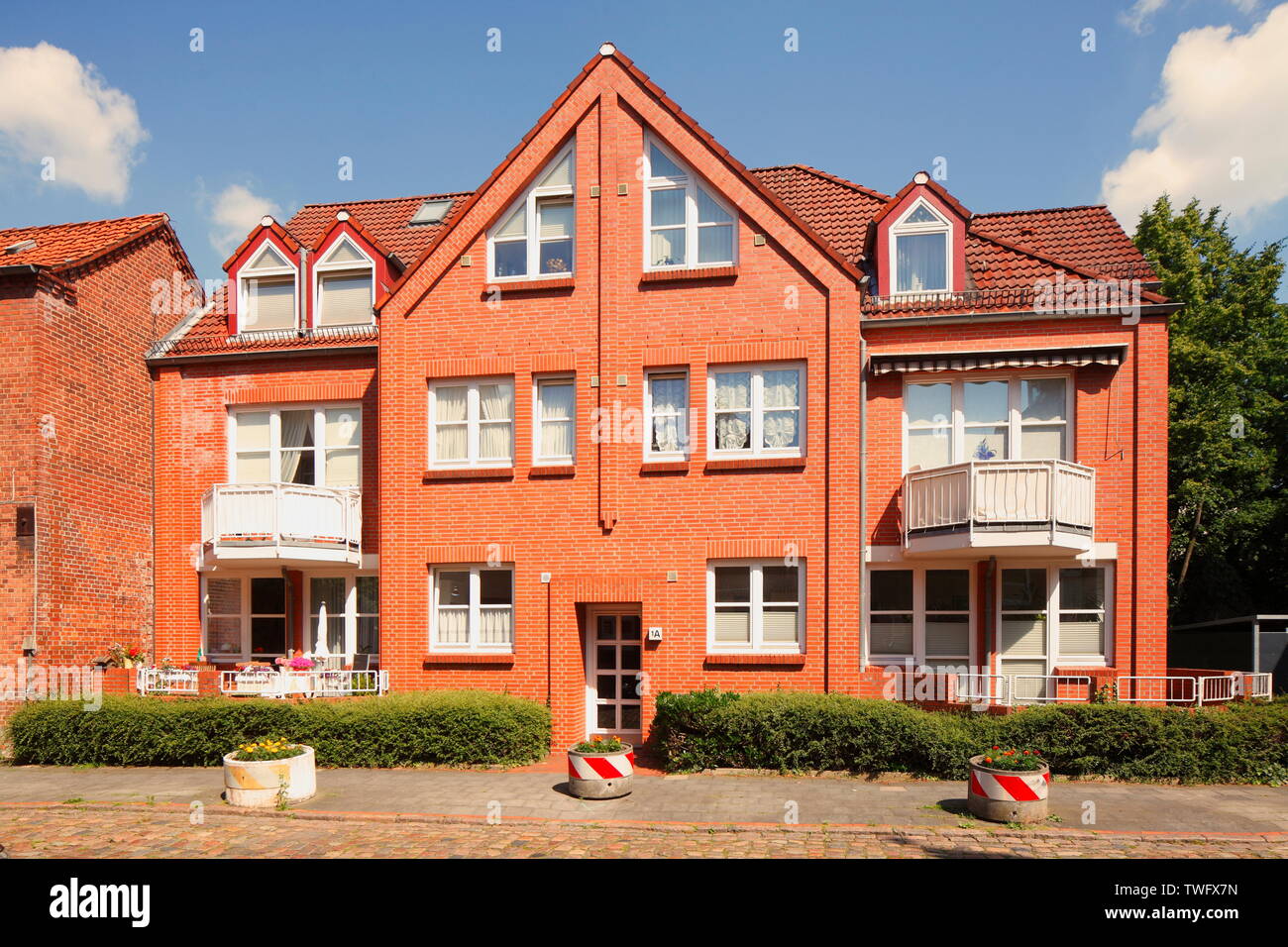 Modern residential building made of brick, multi-family house ...