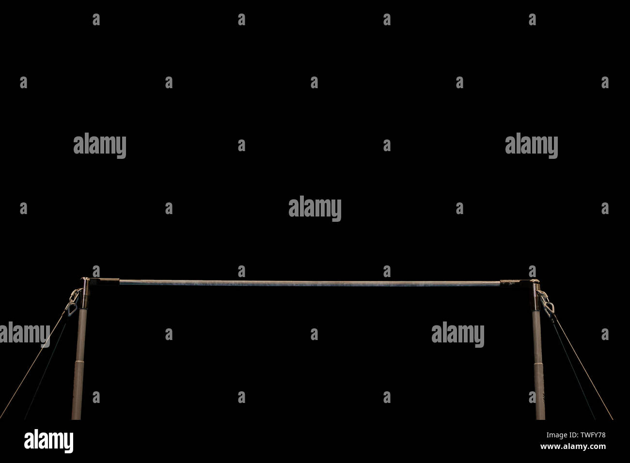 gymnastics horizontal bar on black background Stock Photo - Alamy