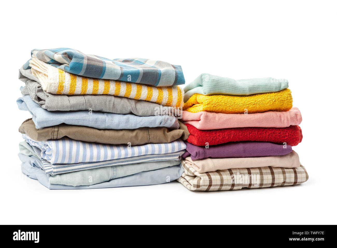 stack of clothing isolated on white Stock Photo - Alamy